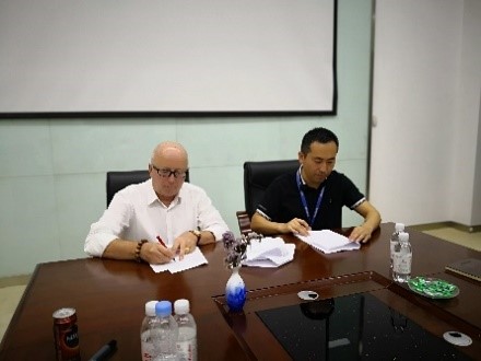 CM and Qingdao Topscomm Sign MES Cooperation Agreement