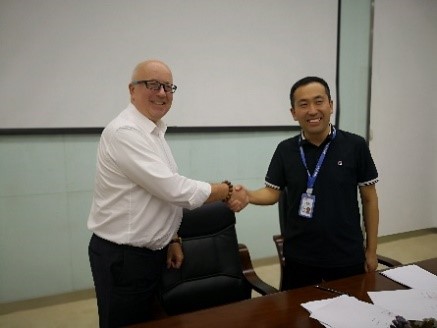 CM and Qingdao Topscomm Sign MES Cooperation Agreement